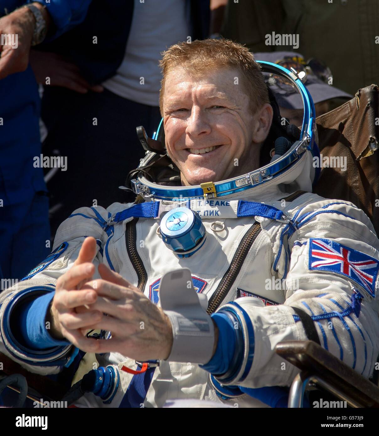 Tim Peake of the European Space Agency rests in a chair outside the ...
