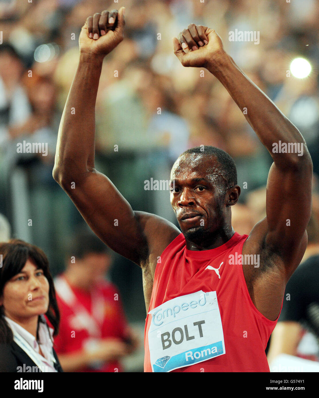Jamaica's Usain Bolt acknowledges the crowd after his victory in the ...
