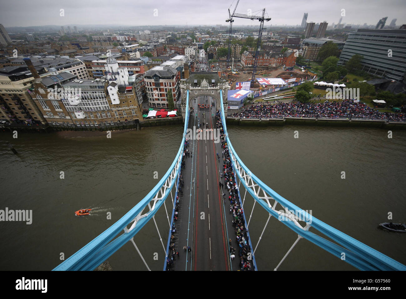 Crowds gather on Tower Bridge on the River Thames, London, for the ...