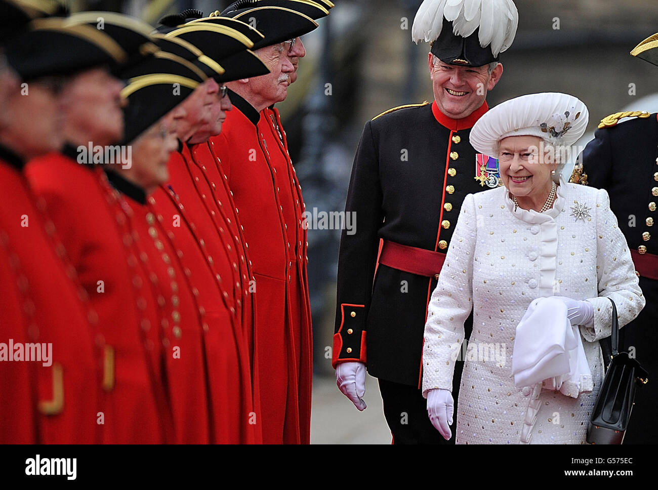 Queen Elizabeth II is greeted by Chelsea pensioners on Chelsea Pier ...