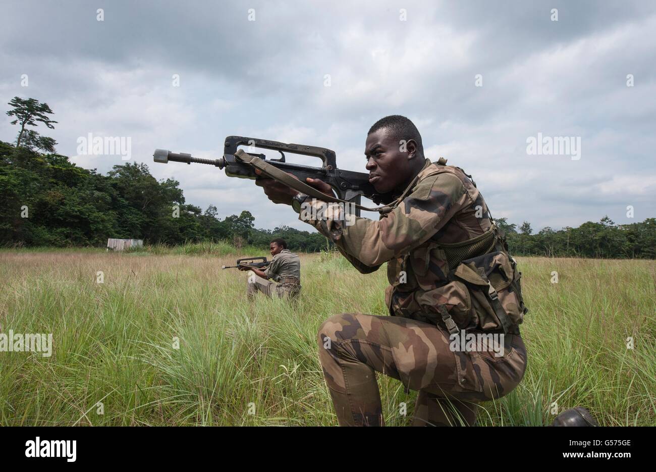 A Gabonese Armed Forces soldier during a simulated combat exercise at ...