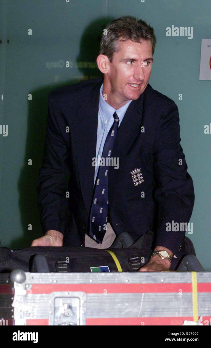 Heathrow Andy Caddick arrives Stock Photo - Alamy