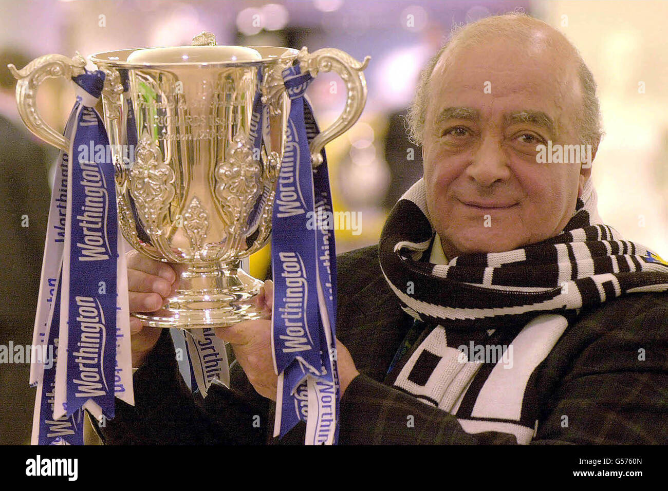 Harrods owner and Chairman of Fulham Football Club, Mohamed Al Fayed (L ...