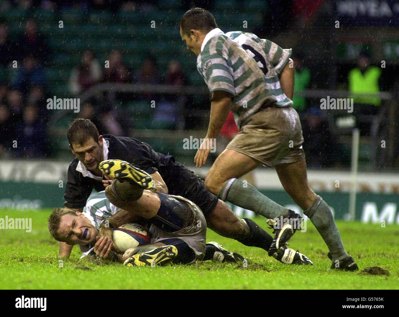 Oxford full back Nicholas Marsh tackles Cambridge's Benjamin Rudge ...