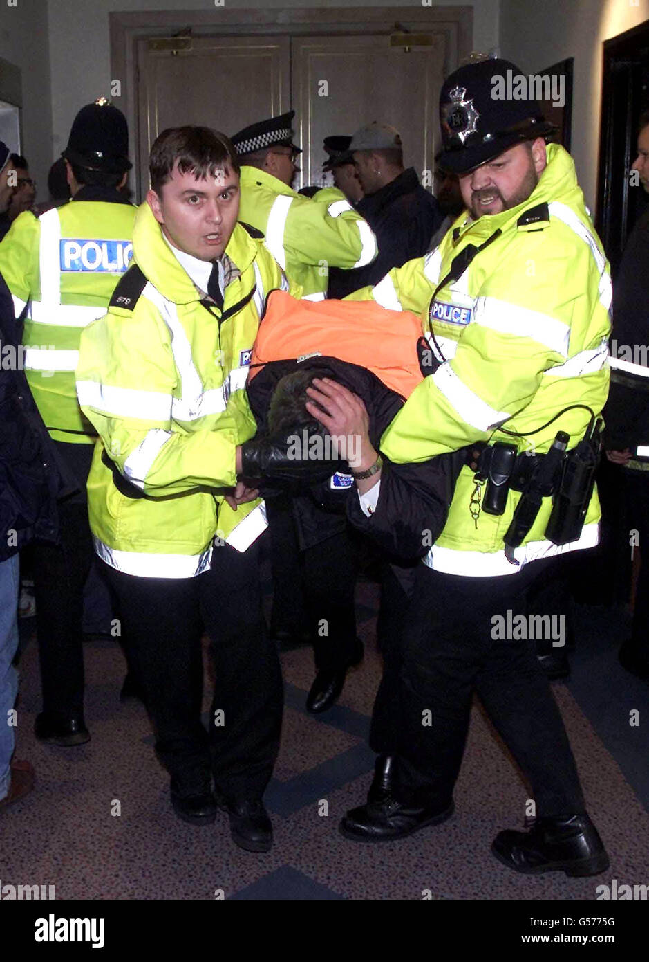 Industry demonstrating injured uniform holding hi-res stock photography ...