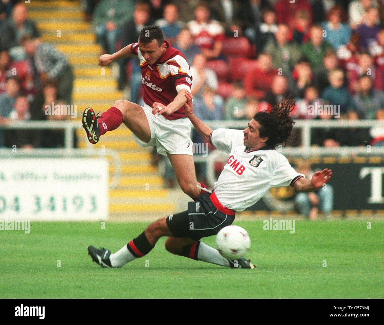 Northampton towns david leaps over attempted tackle fulhams robbie ...