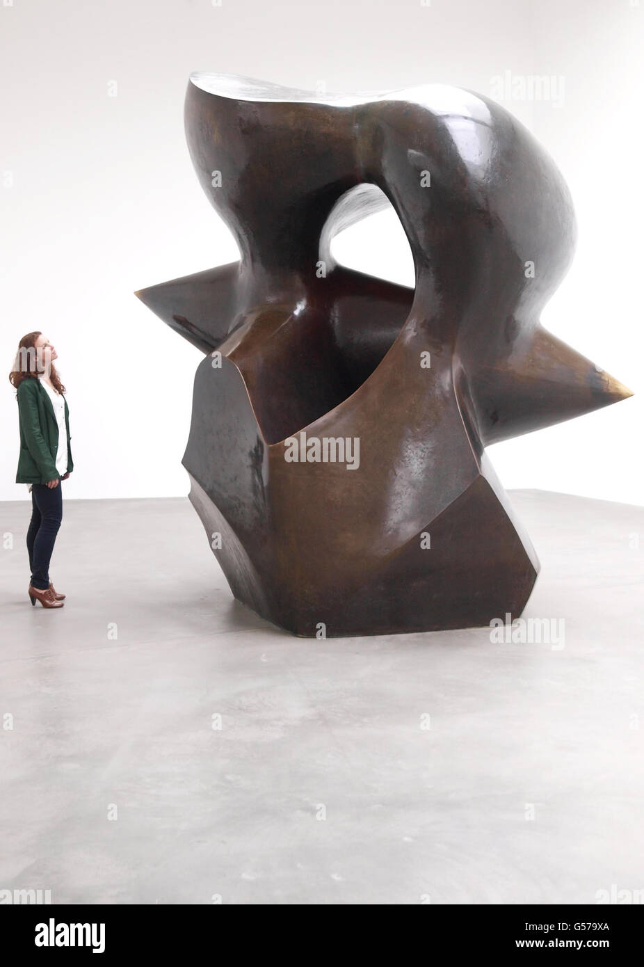 Gallery visitor Phoebe Moore looks at artist Henry Moore's Large ...