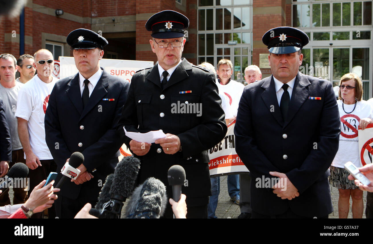 Station Manager Timothy Woodward speaks to the media flanked by Watch ...