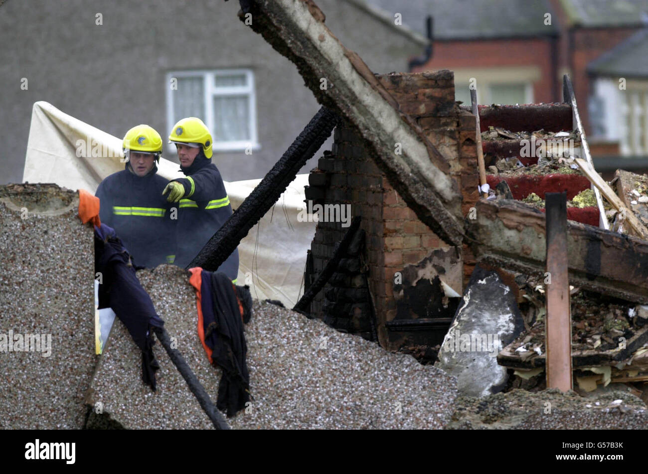 Firemen at the scene of a house blast in Batley, near Leeds, in which ...
