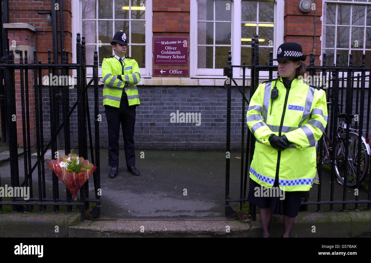 Police outside the school gates of Oliver Goldsmith's Primary School in ...