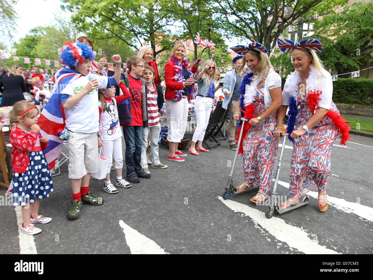 Residents Gill Carrigan (left) and Tracy McKeown on scooters at a ...