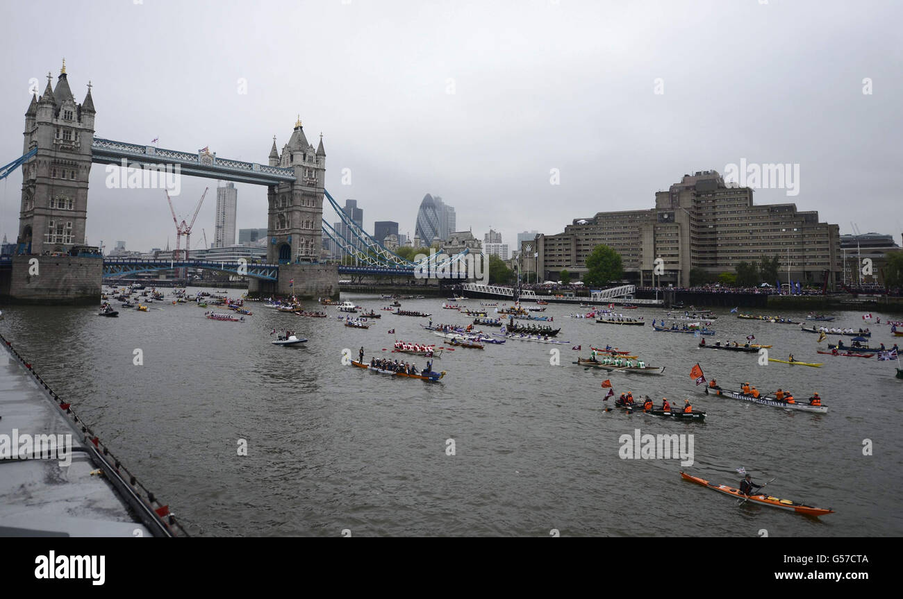 Boats pass under tower bridge diamond jubilee river pageant hi-res ...