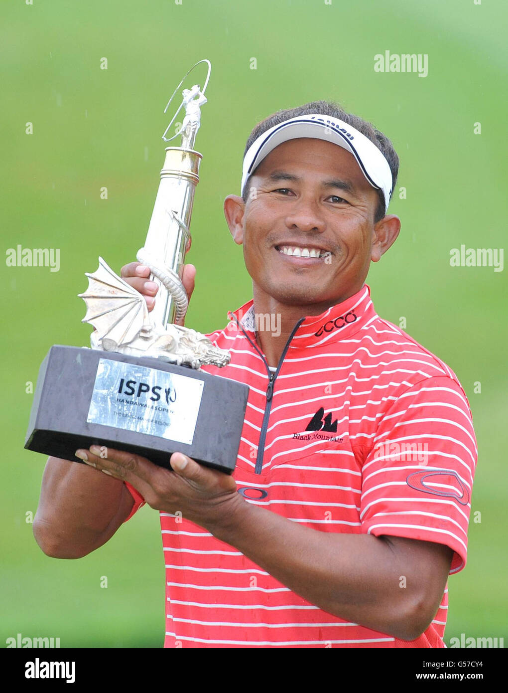 Thailand's Thongchai Jaidee poses with the trophy after winning the ...