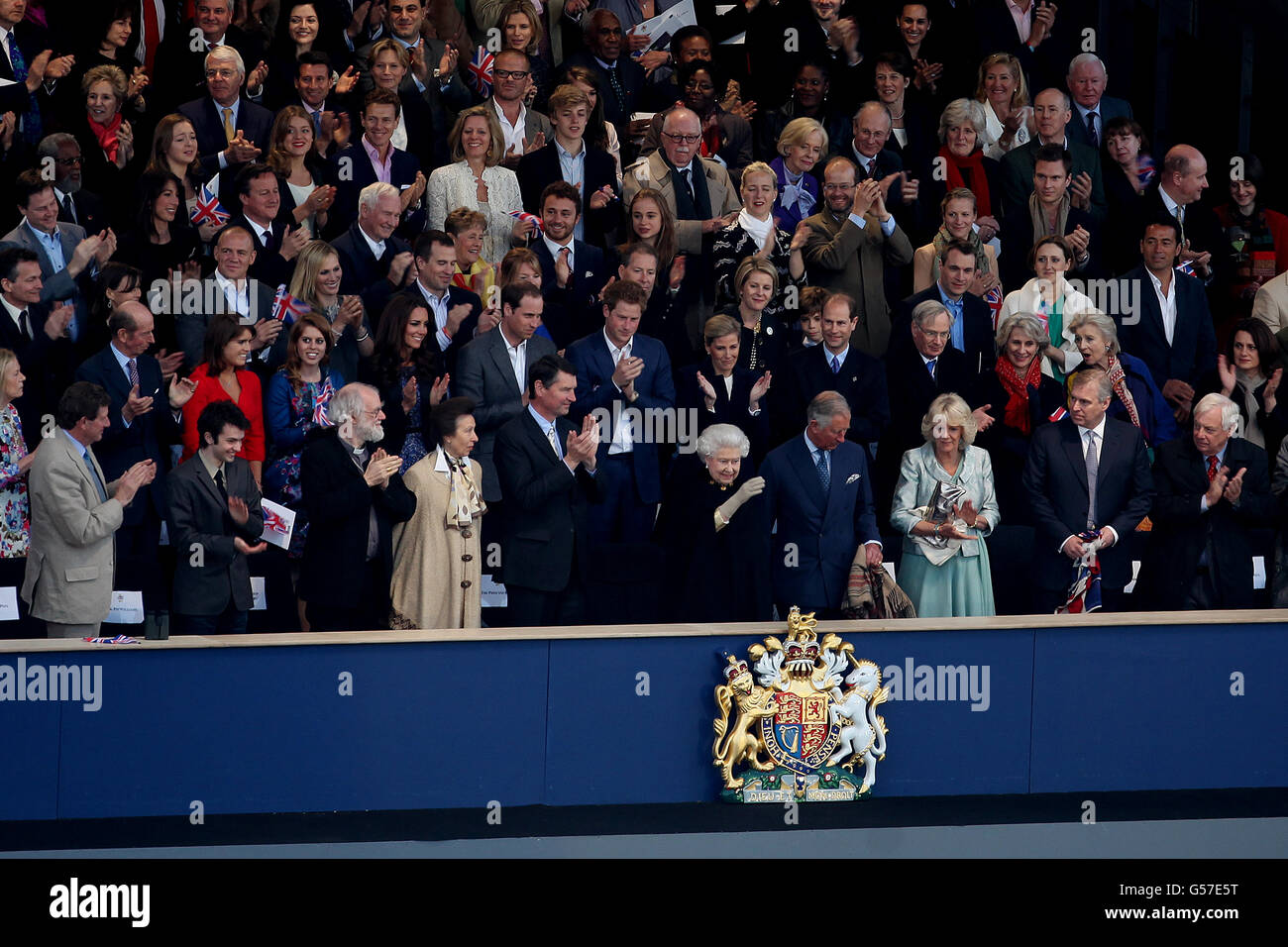 Queen Elizabeth II waves to the crowd attending the Diamond Jubilee ...