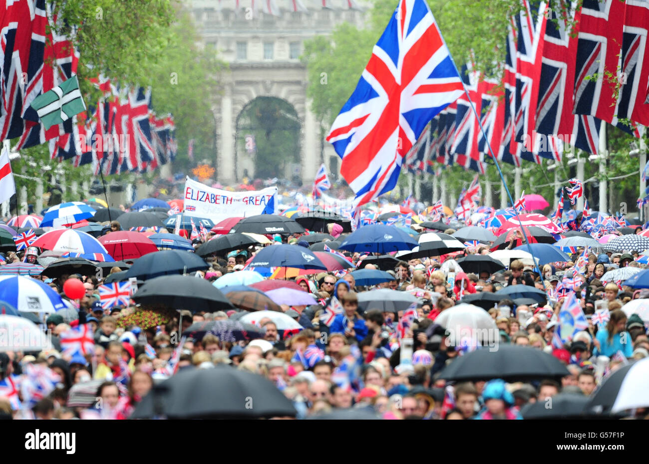 The crowd comes down The Mall to see Queen Elizabeth II appear on the ...