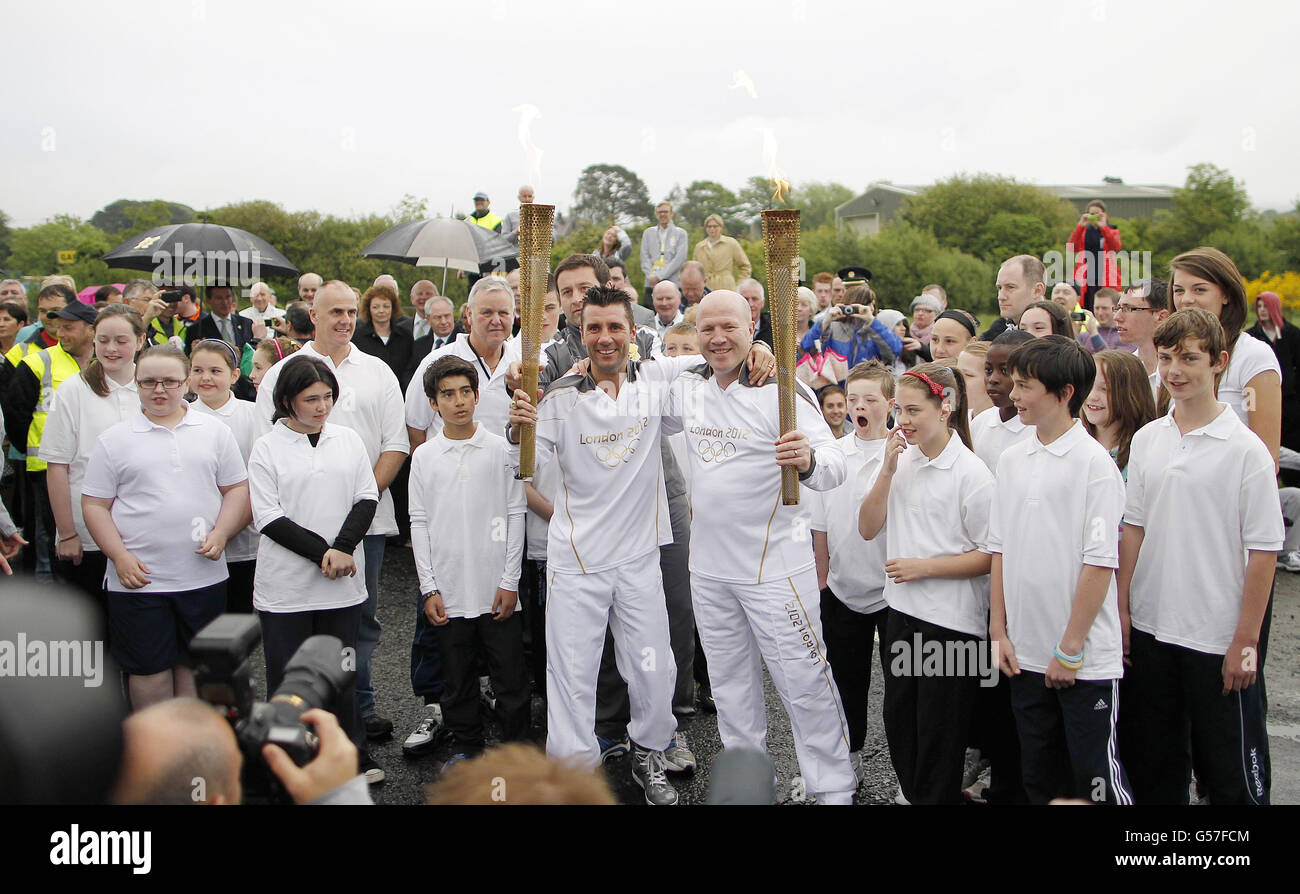 Olympic silver medal winning boxer Michael Carruth (right) receives the ...