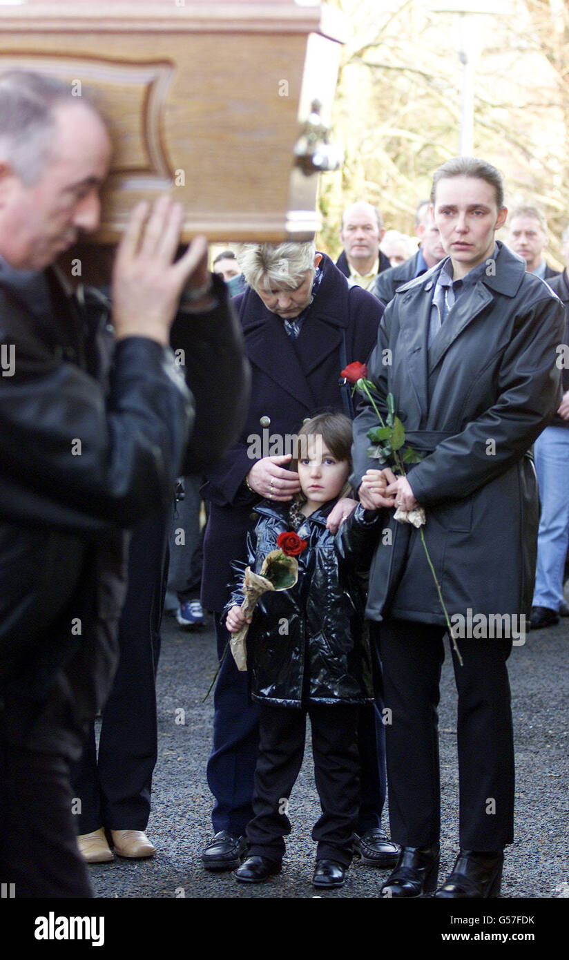 Shannon, 5, the daughter of Gary Moore with family members, watching as ...