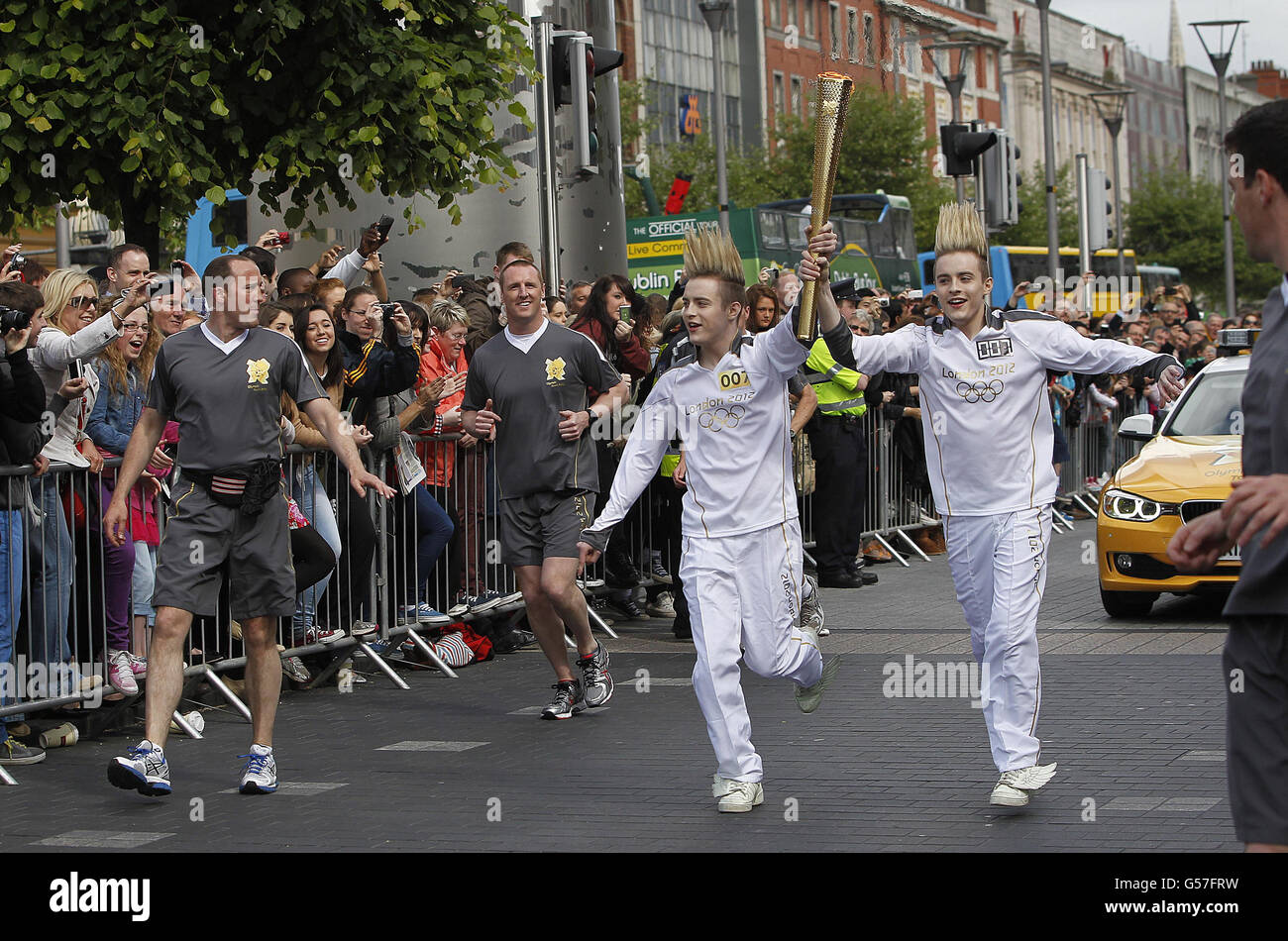 Day 19 - Olympic Torch Relay Stock Photo - Alamy