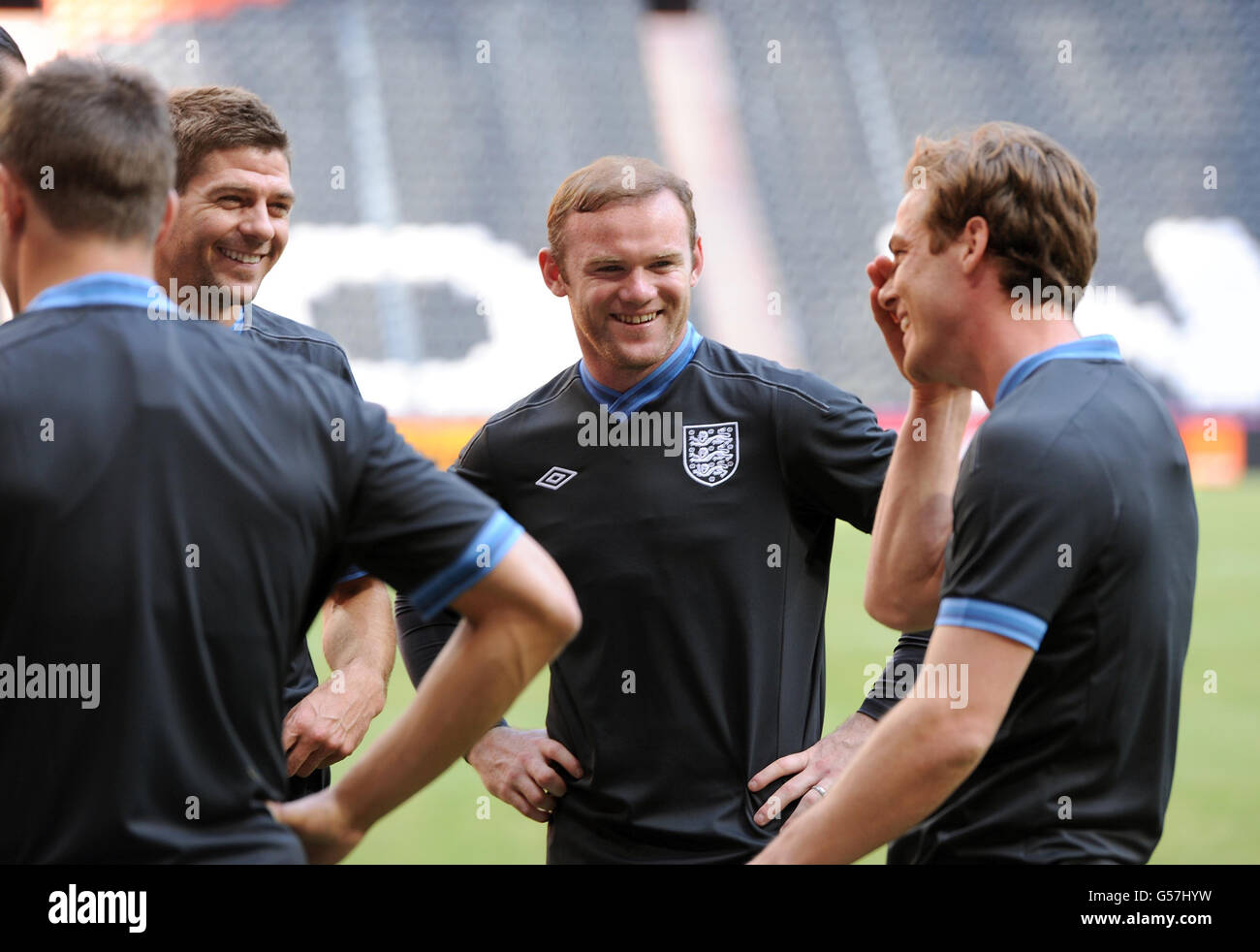 England's Steven Gerrard shares a joke with Wayne Rooney and Scott ...