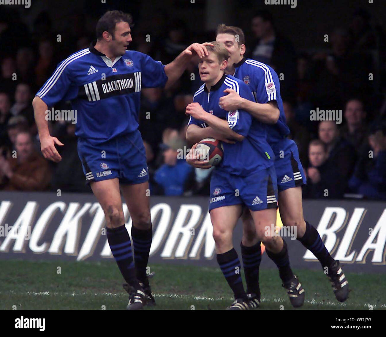 Ben Clarke (left) and Dan Lyle (right) of Bath congratulate Iain ...