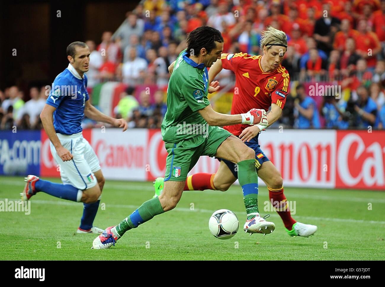 Spain's Fernando Torres (right) tries to get around Italy goalkeeper ...