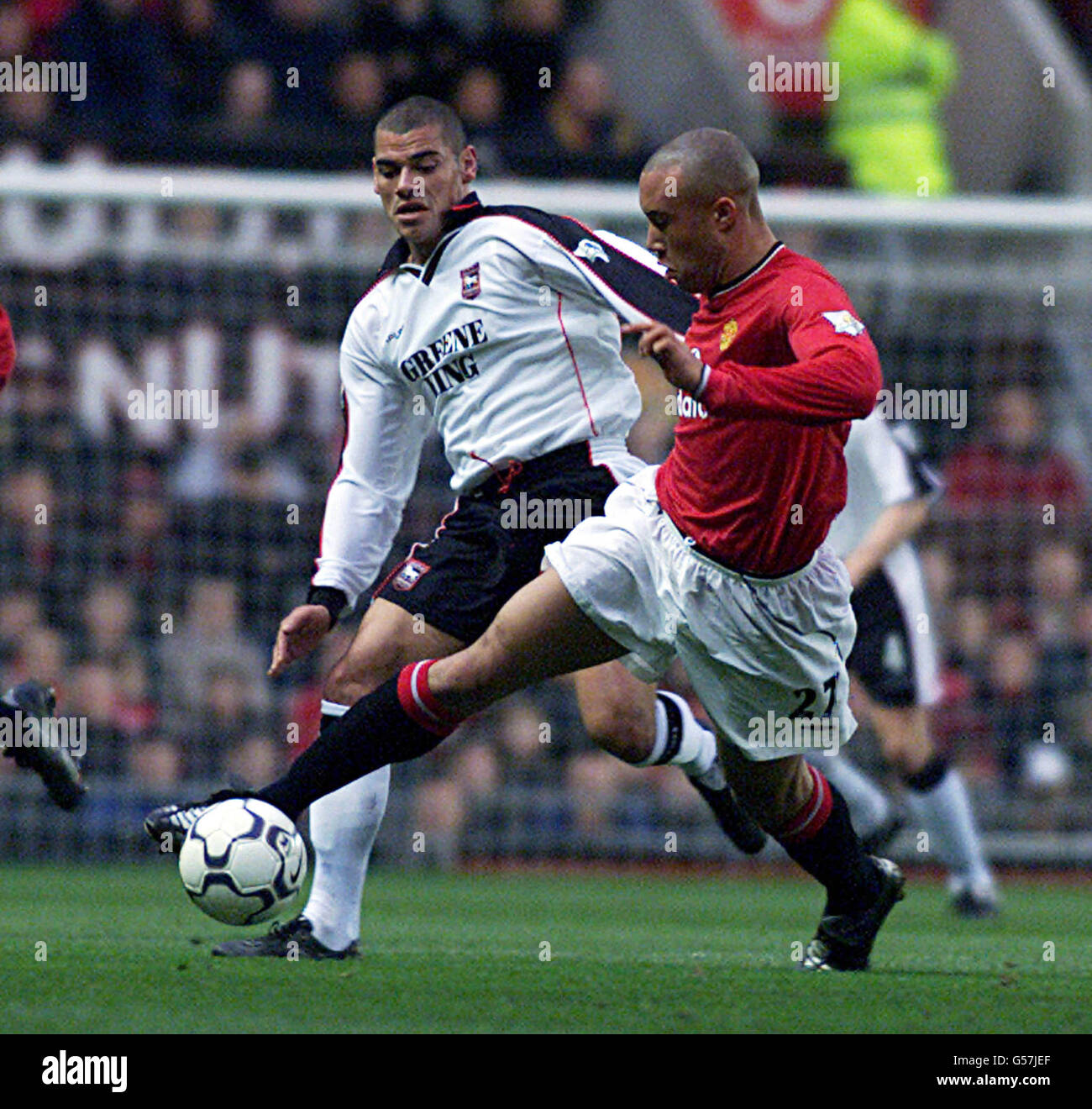 Ipswich Town's Jermaine Wright (left) battles for the ball with ...