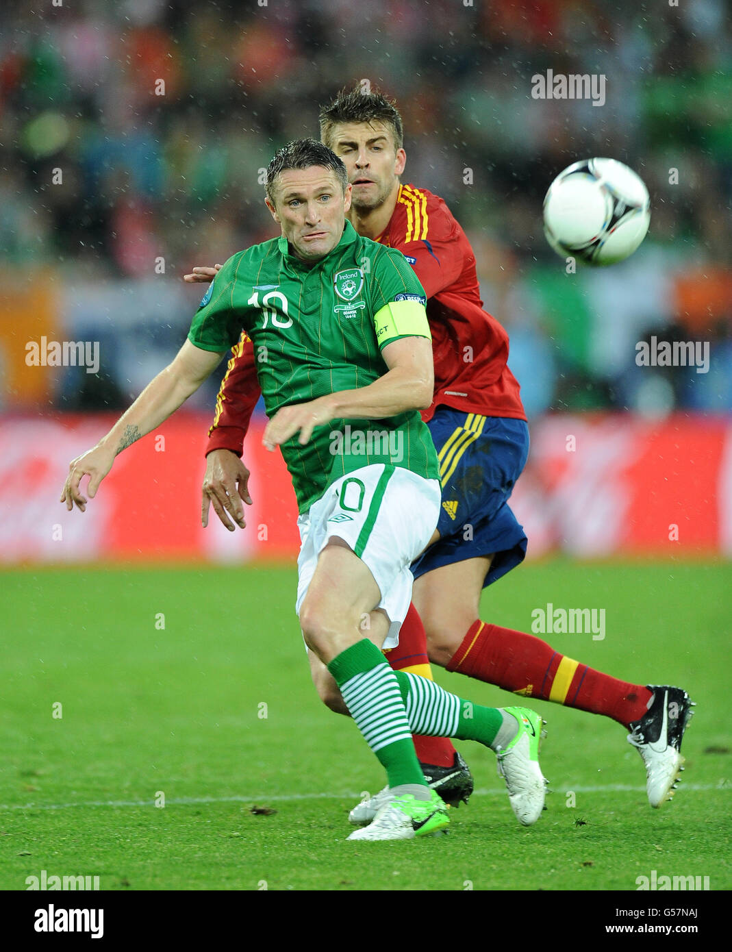 Spain's gerard Pique and Republic of Ireland's Robbie Keane Stock Photo ...