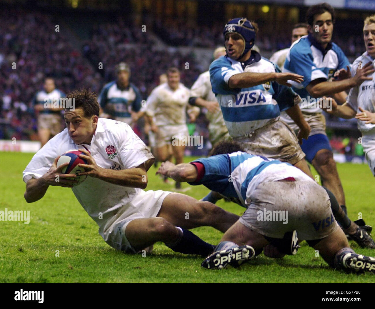 England's Dan Luger is prevented from scoring a try by the Argentinian ...