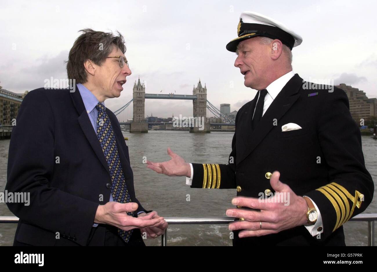 Uniform politics talking tower bridge river cap arms raised hi-res ...
