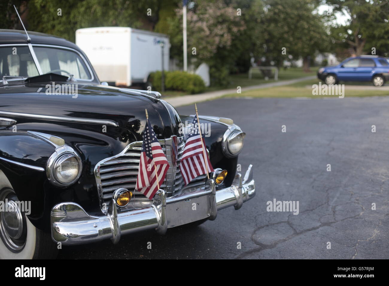 old antique car with American flags Stock Photo - Alamy