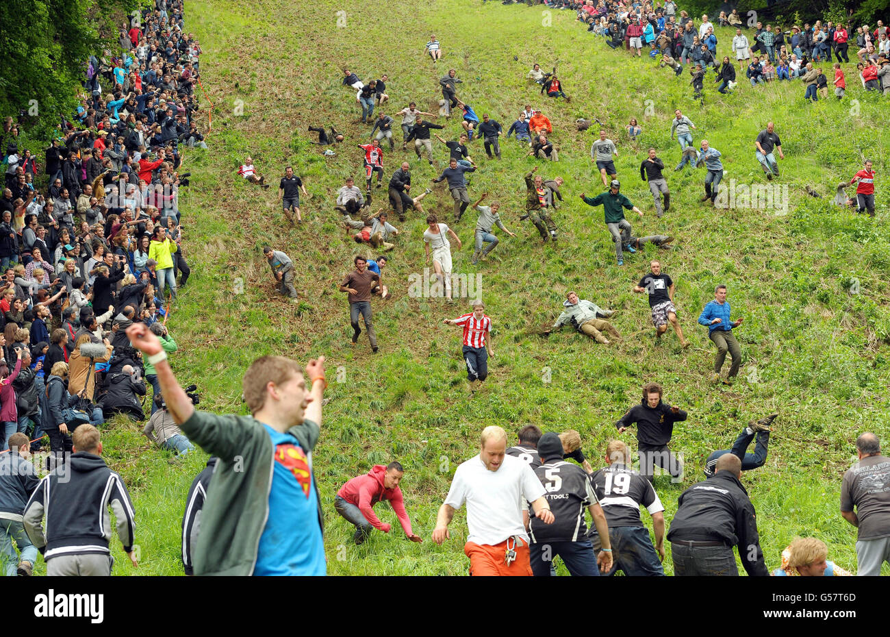 Competitors in the Jubilee Cheese Race during the annual Cheese Rolling ...