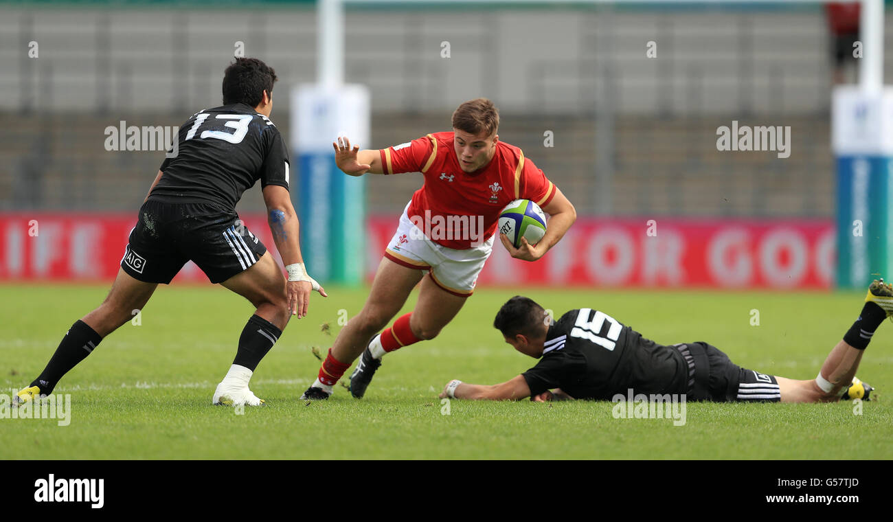 Wales' Joe Gage is tackled by New Zealand's Shaun Stevenson during the ...