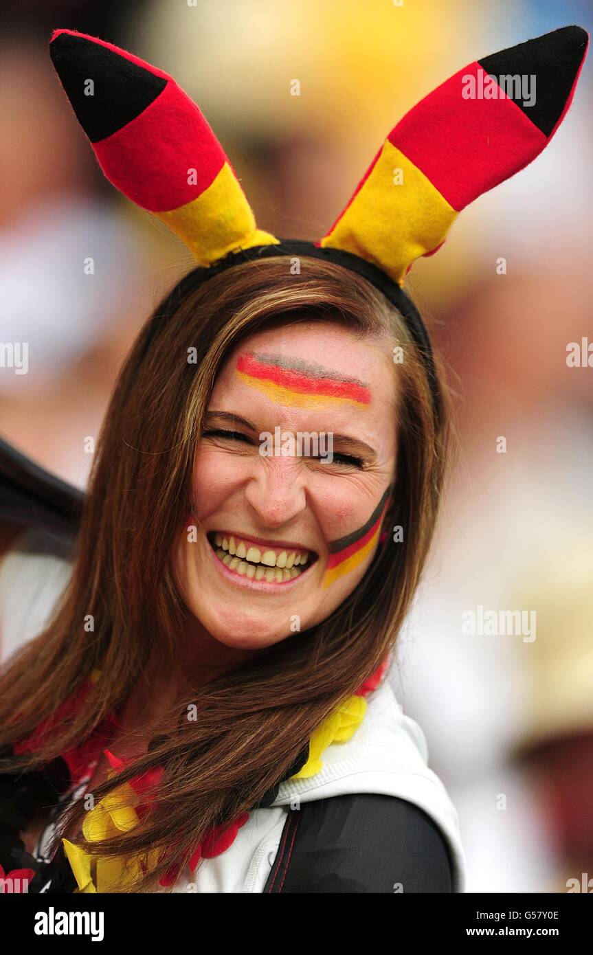 A germany fan shows her support in the stands hi-res stock photography ...