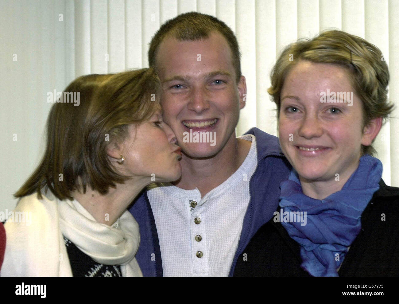 Thomas Hart Dyke is greeted by his mother Sarah (L) and sister Anya at ...