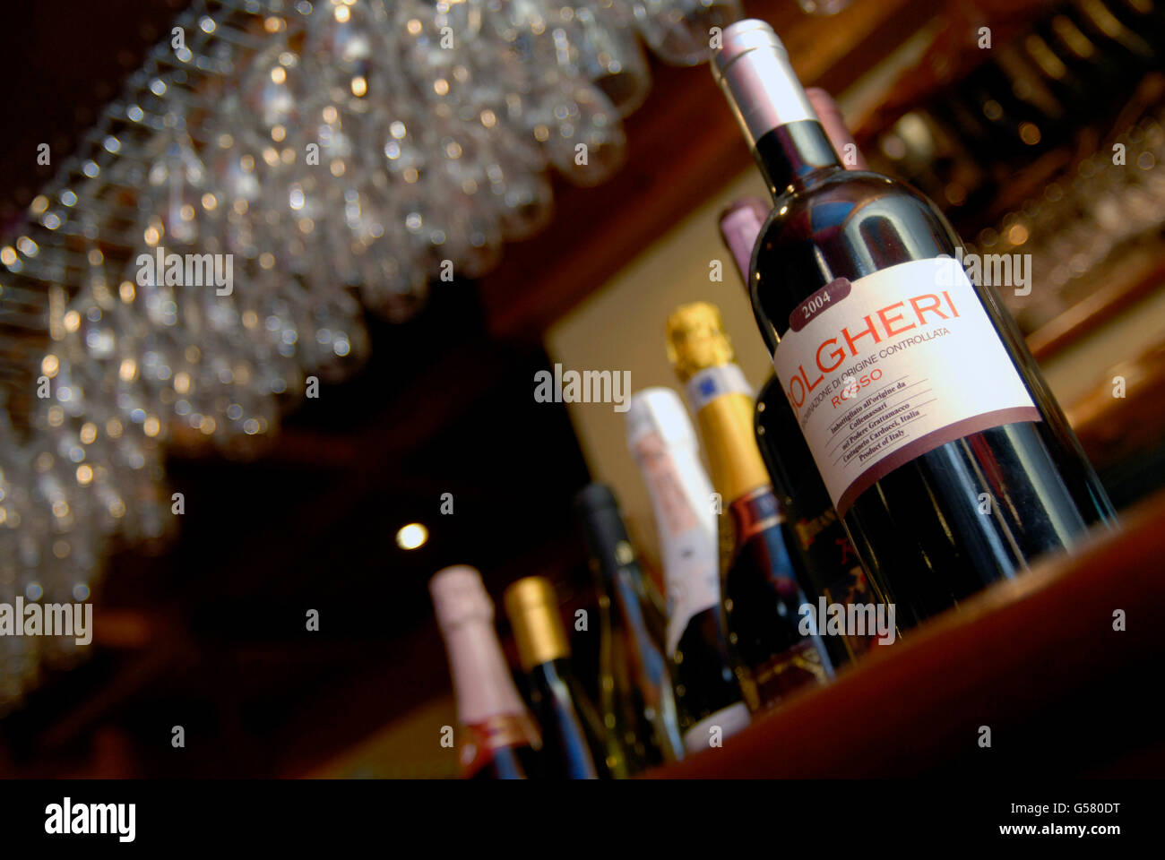 Bottles and glasses in restaurant Stock Photo - Alamy