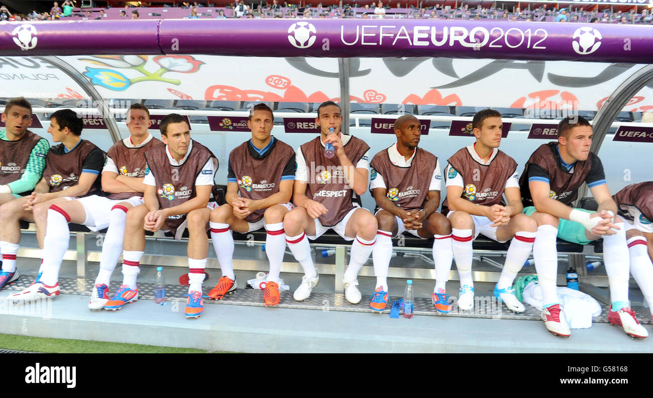 Jordan henderson and martin kelly sit on the bench hi-res stock ...