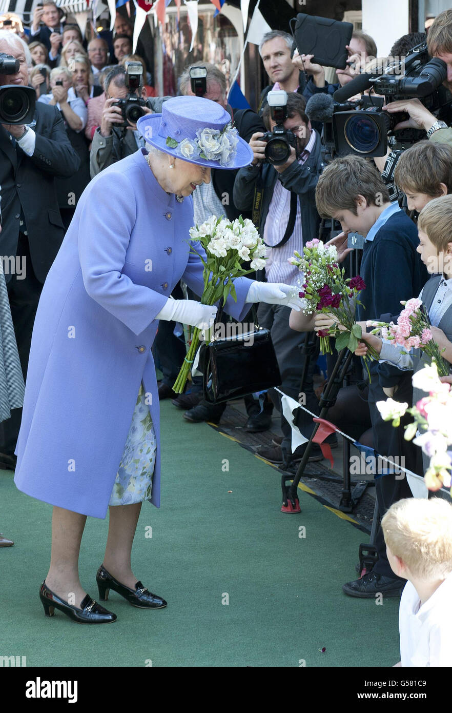 Queen Elizabeth II meets well wishers as she visits Hitchin Market ...