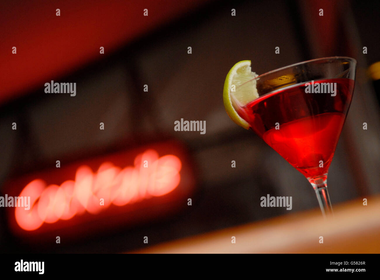 Red cocktail in a night bar Stock Photo - Alamy