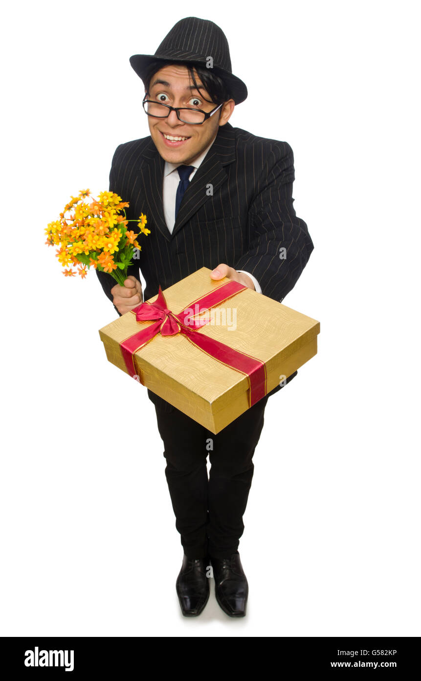 Funny man with flowers and giftbox Stock Photo - Alamy