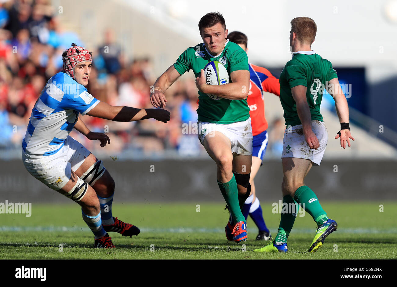 Ireland's Jacob Stockdale gets past Argentina's Franco Molina during ...