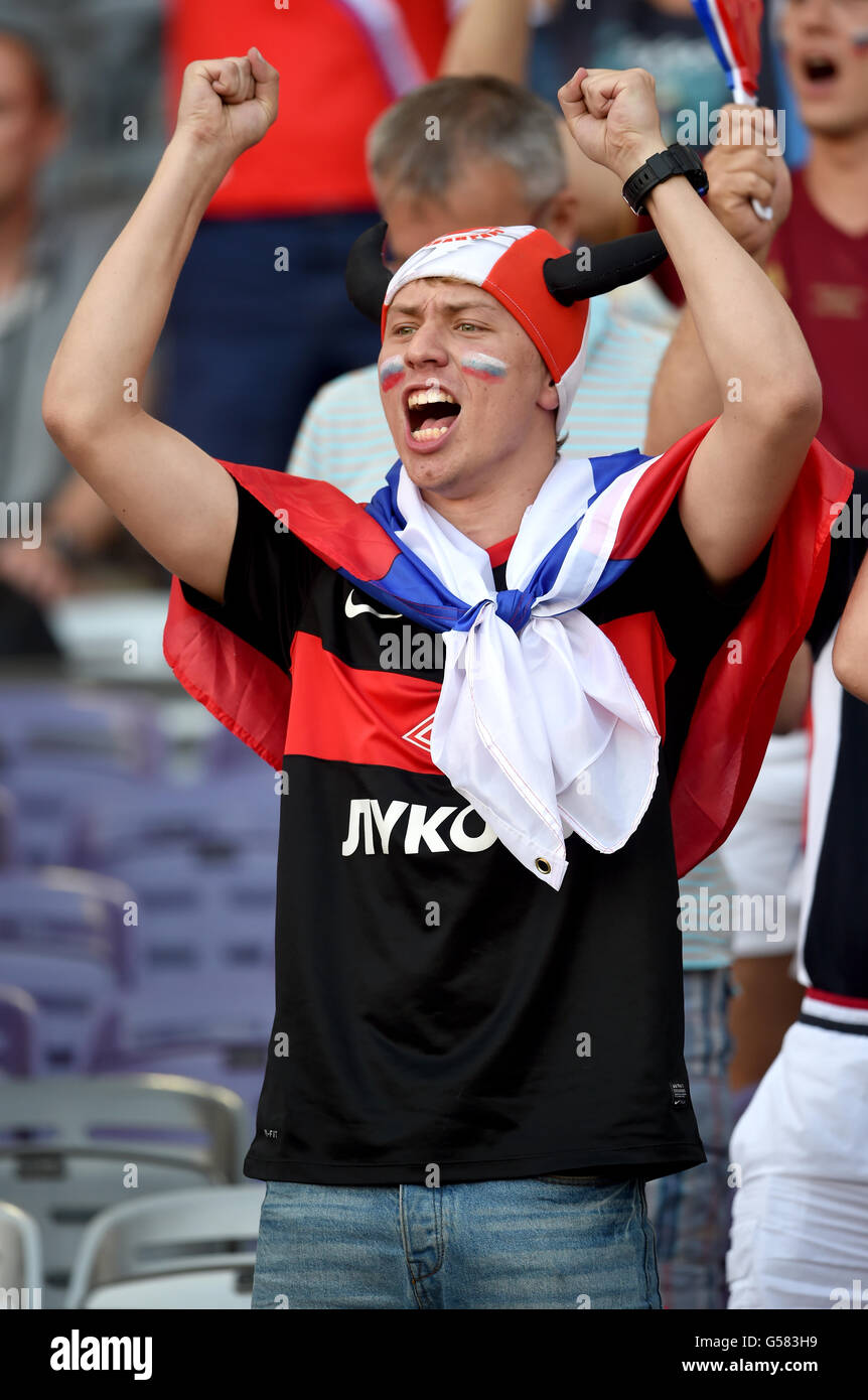 A Russia fan cheers on his side in the stands before the UEFA Euro 2016 ...