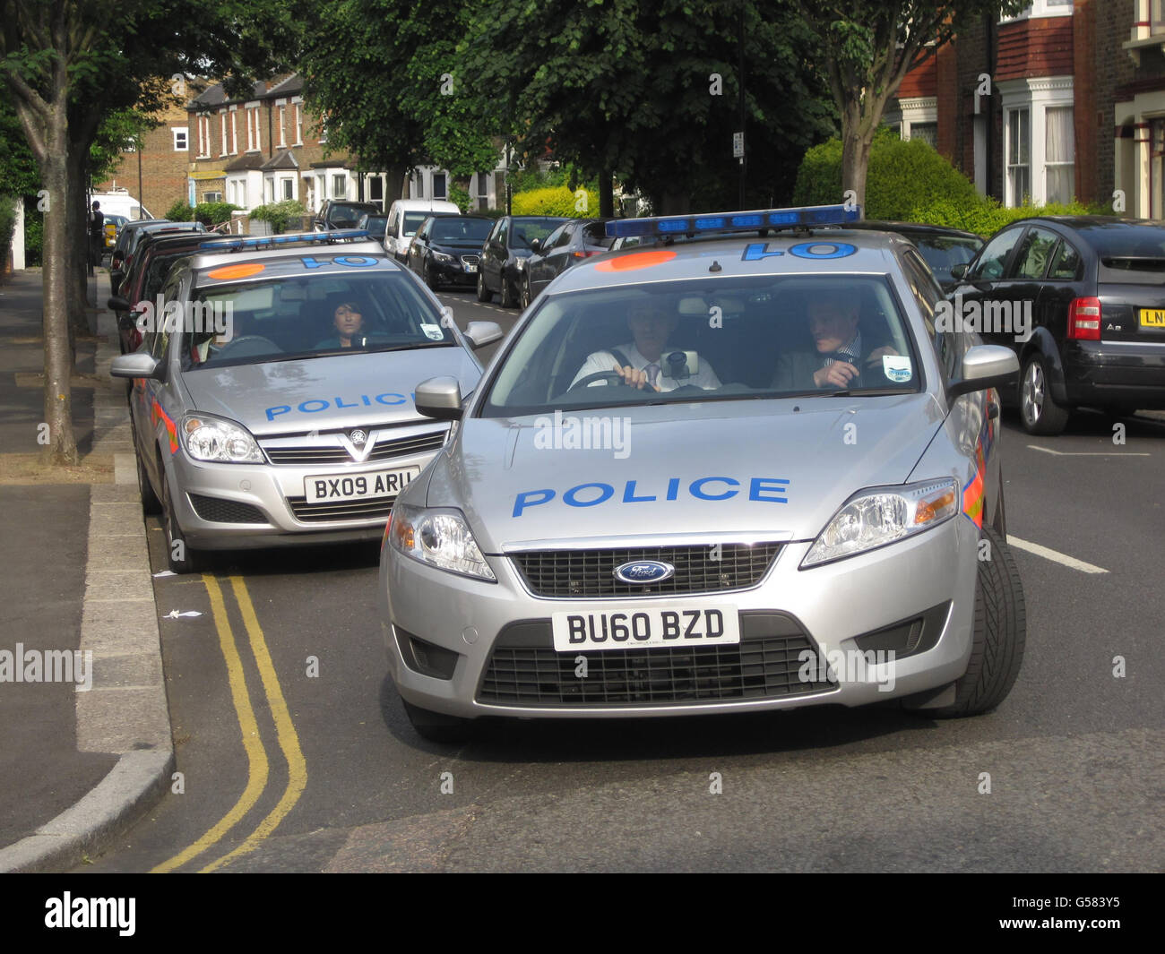 Police near an address in Ealing, west London, where a 32-year-old man ...