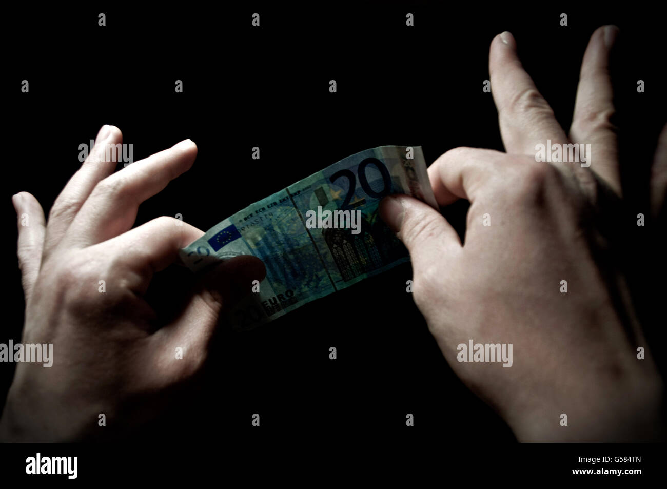 Two hands with money Stock Photo - Alamy