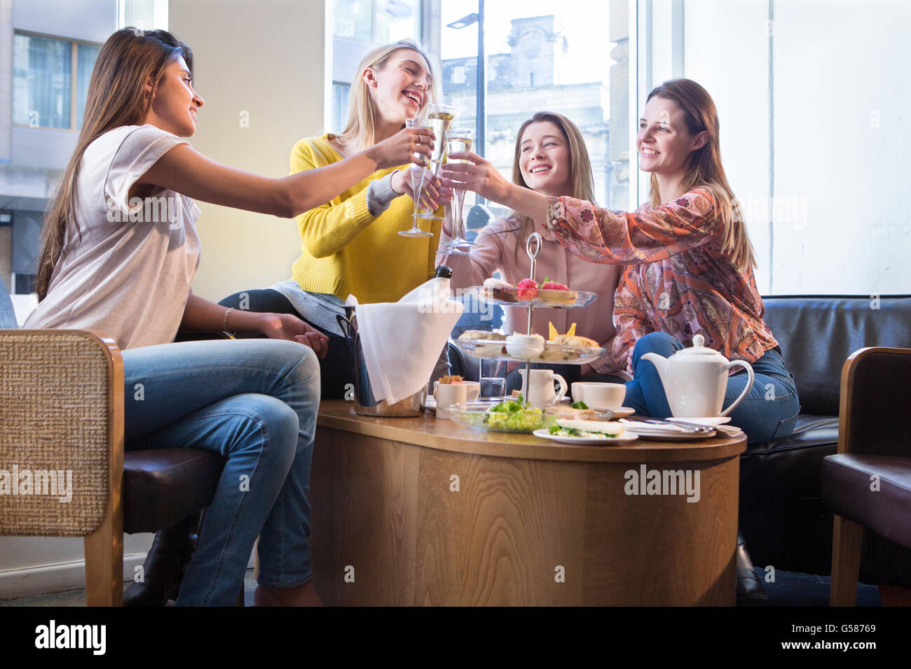 Women friends afternoon tea champagne hi-res stock photography and ...