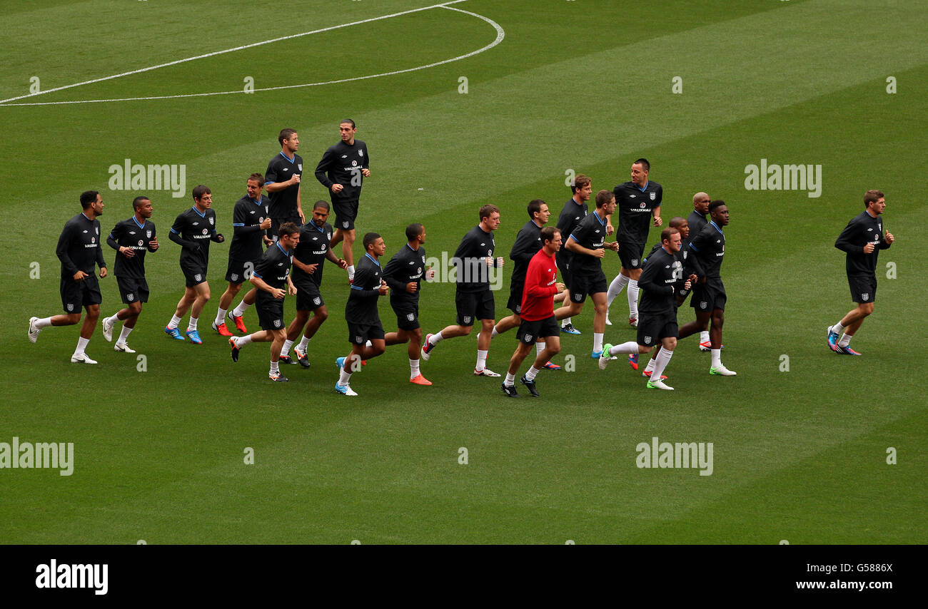 England's players warm up during a training session at Wembley Stadium ...