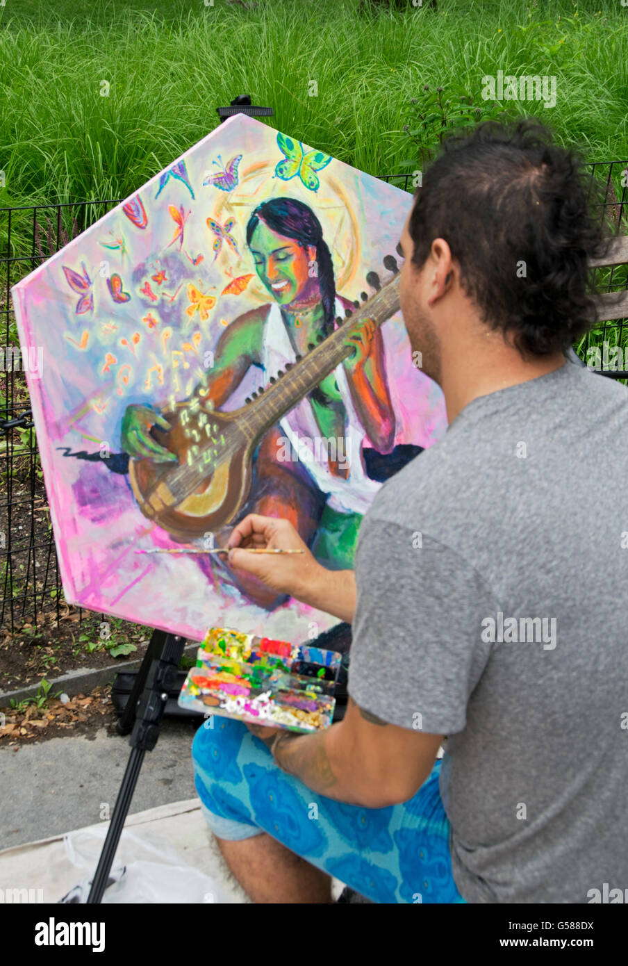 Portrait of painter Steven Garcia working on a new piece in Washington ...