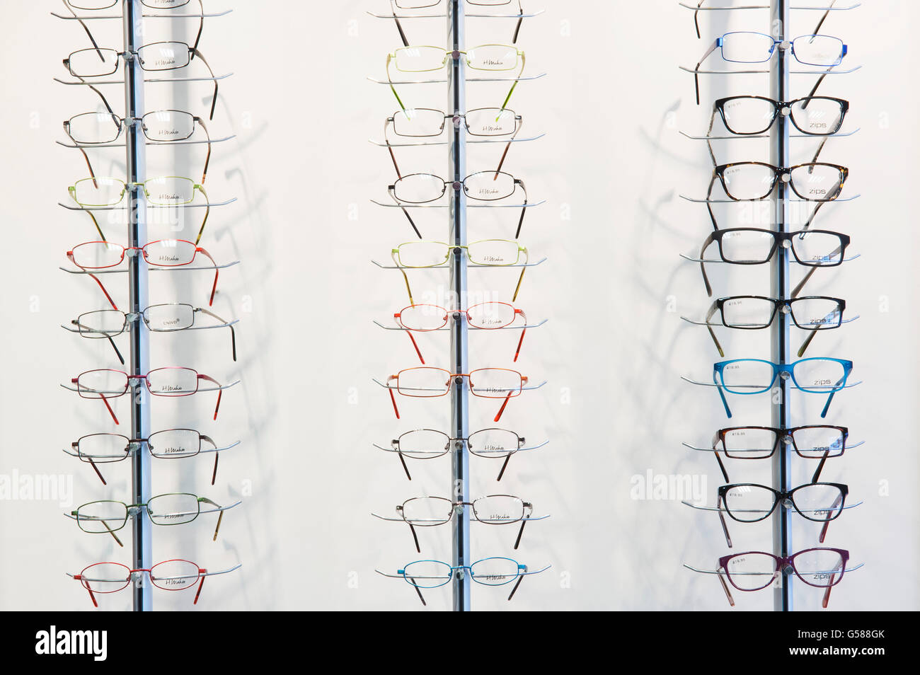 Optometrist choosing eye test lenses hi-res stock photography and ...
