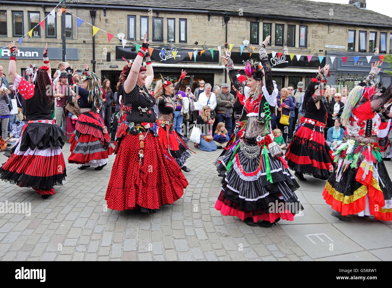 Members of 400 Roses dance troop dancing in St George's Square, Hebden ...