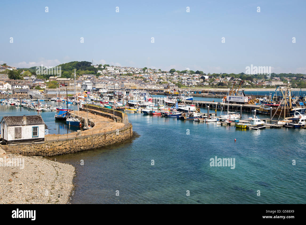 Boats at moorings in the harbour of fishing port of Newlyn, Cornwall ...