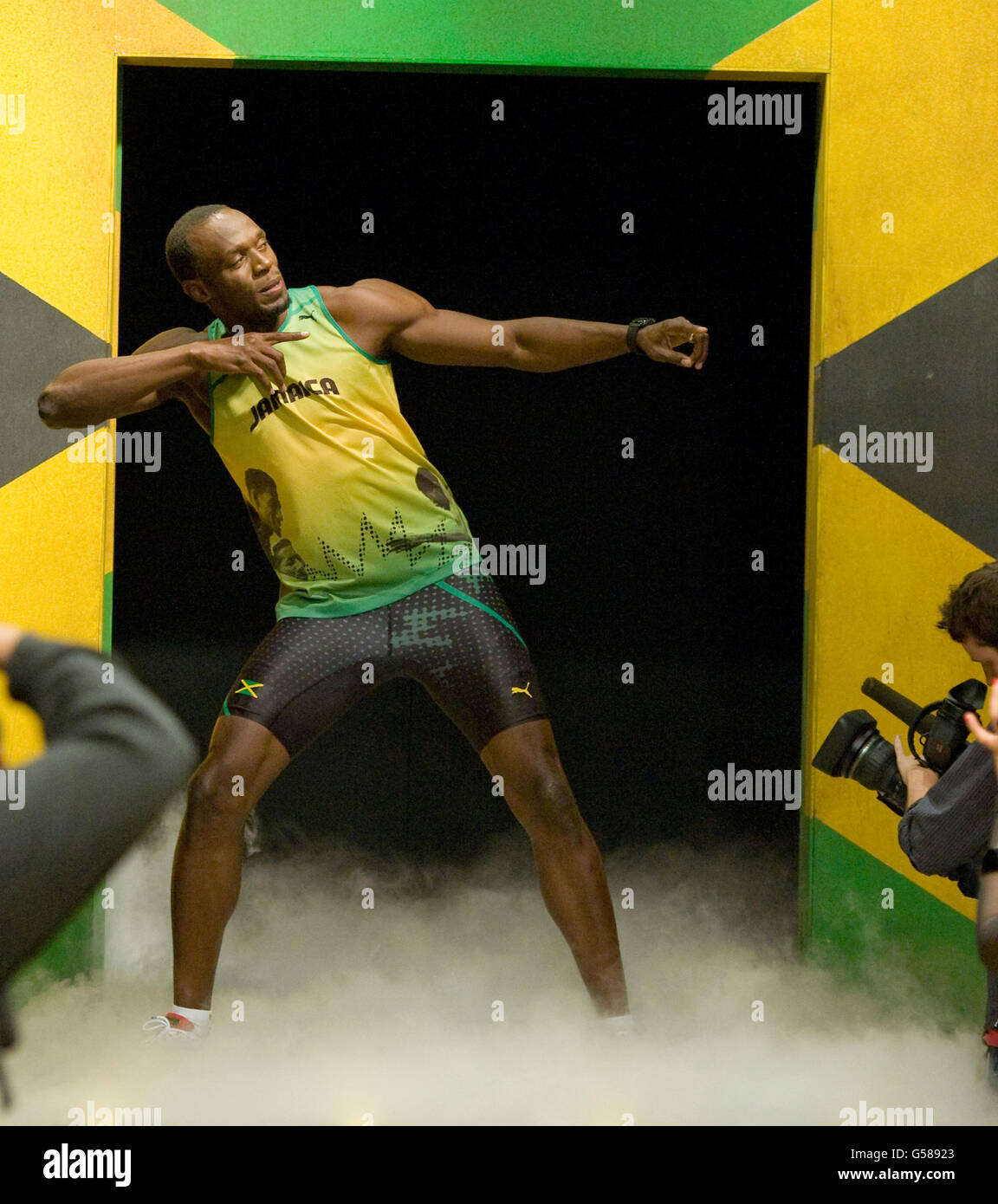 Jamaican sprinter Usain Bolt wearing the 2012 Jamaican Olympic kit ...